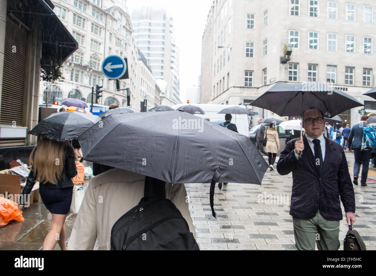 London, UK. 9th Aug, 2017. Grey, wet day in London as forecasted heavy ...