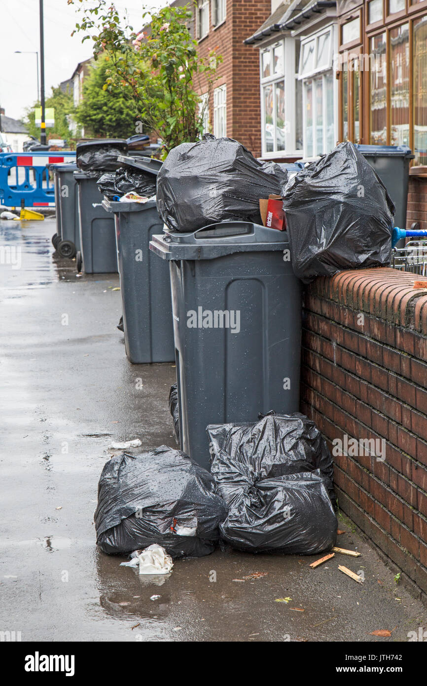 Birmingham, UK. 09th Aug, 2017. Refuse bags continue to pile up on the ...