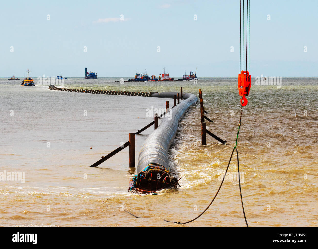 A new flood water outfall pipe has been transported by ship from Norway ...