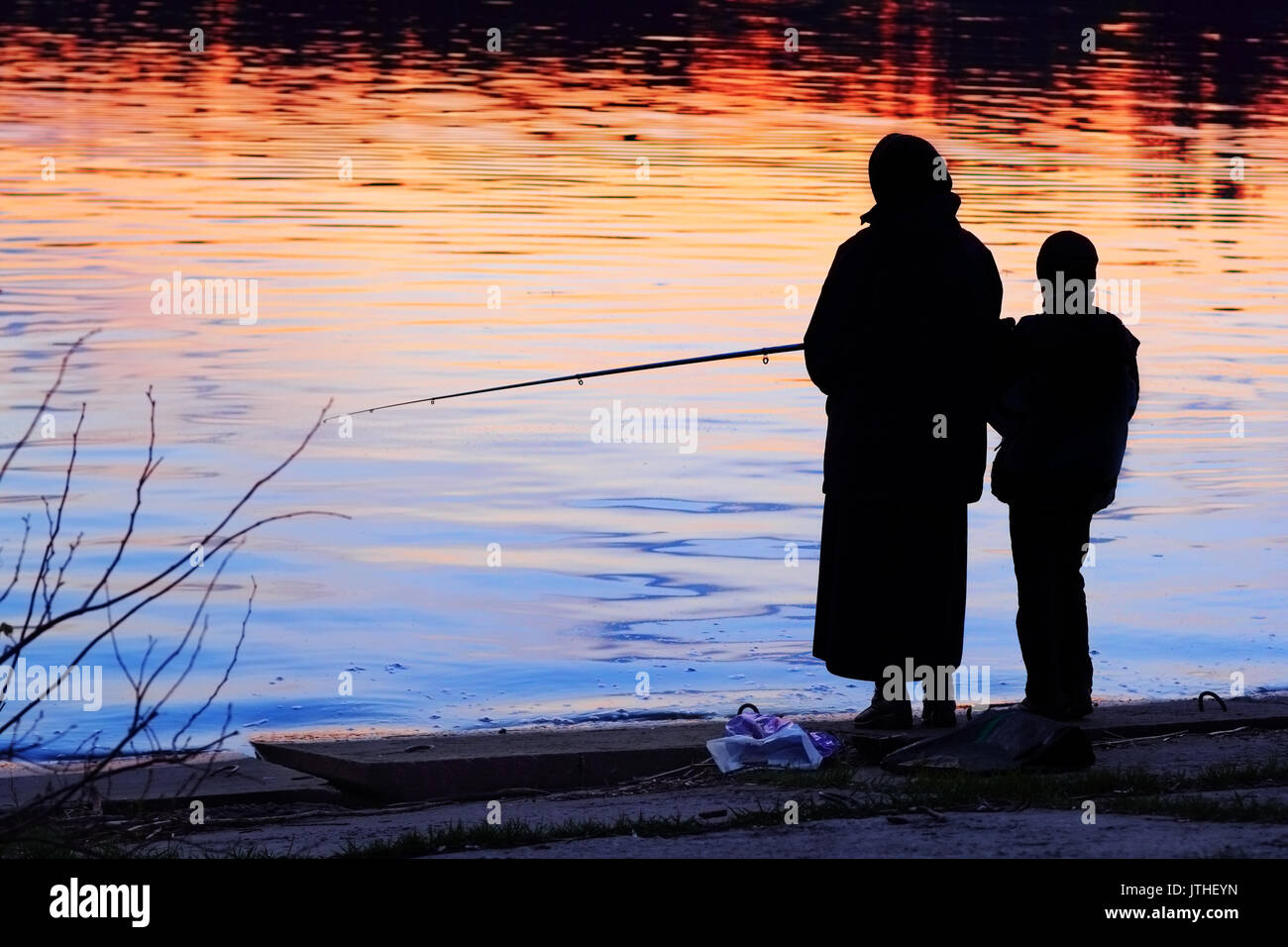 Mother and son fishing hi-res stock photography and images - Alamy