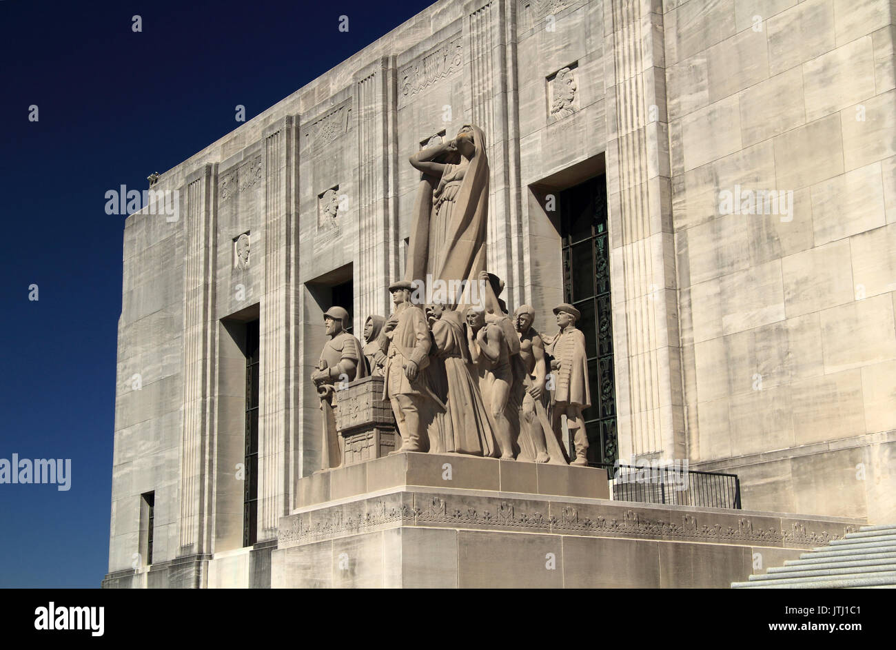 Elaborate sculptures at the base of the state capitol building ...