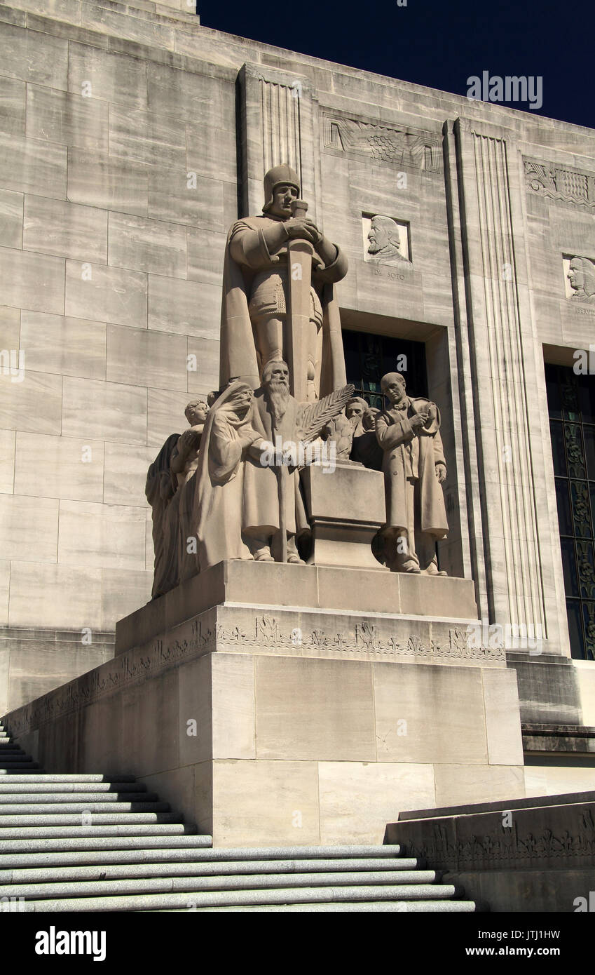 Elaborate sculptures at the base of the state capitol building ...