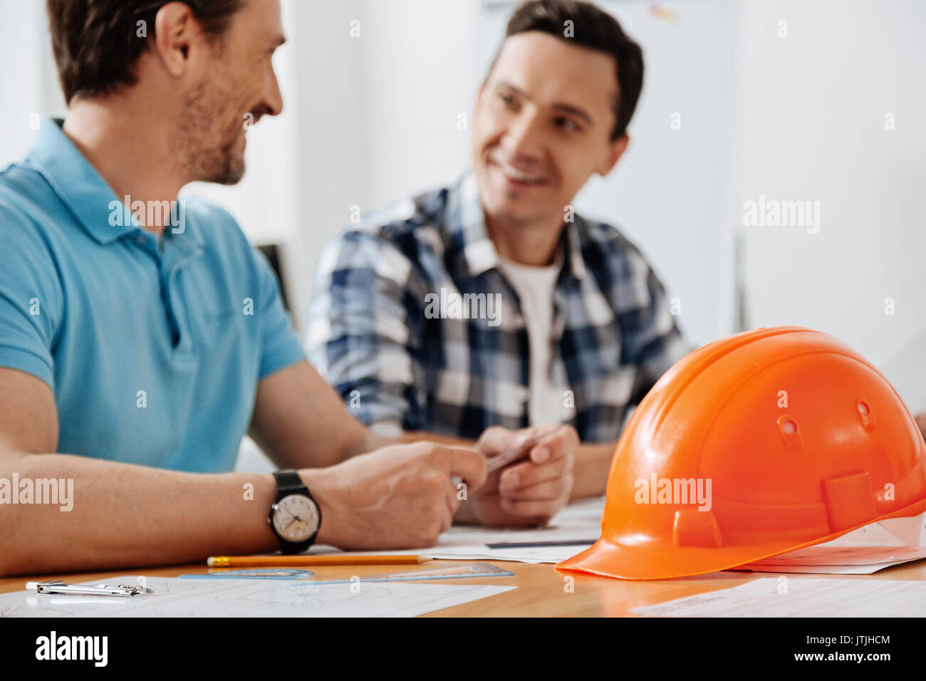 Two colleagues socializing during the meeting break Stock Photo - Alamy