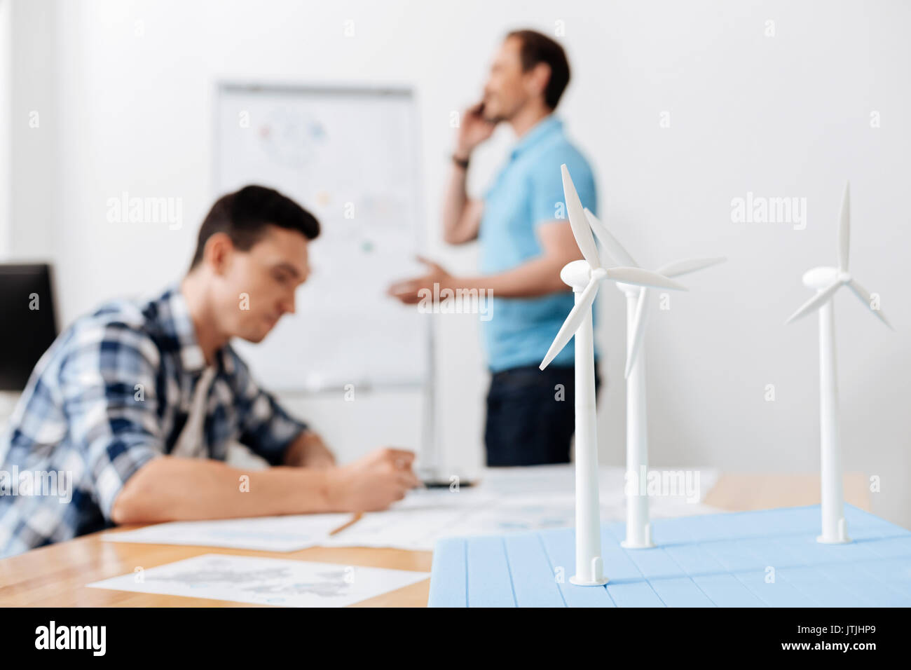Every worker in the office being busy with work Stock Photo - Alamy