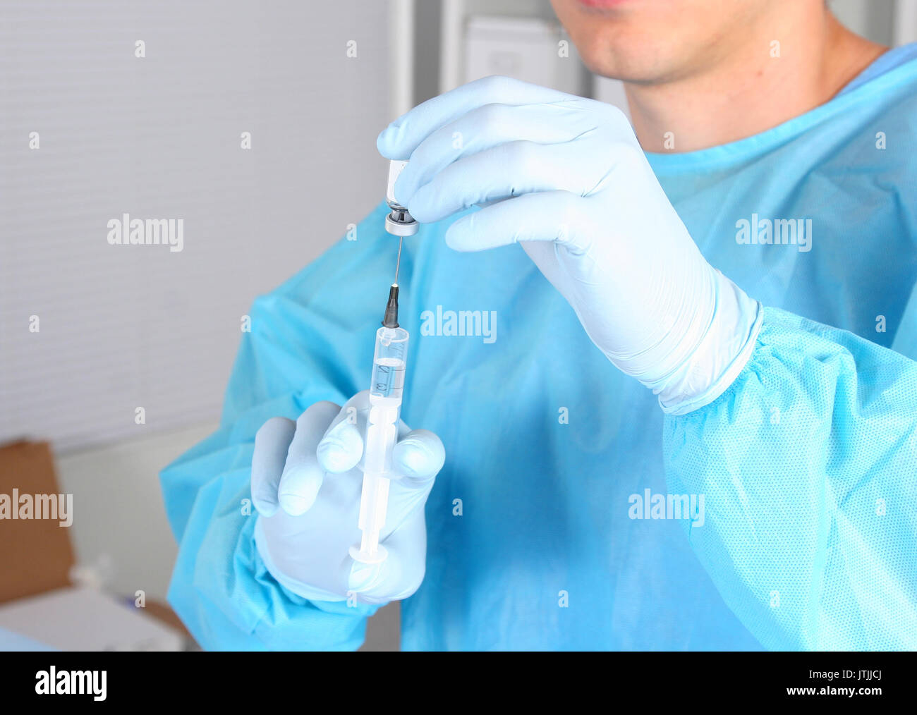 Syringe, medical injection in hand, palm or fingers. Medicine plastic ...