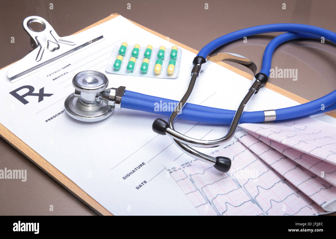 RX prescription, Red heart and a stethoscope on white background Stock ...