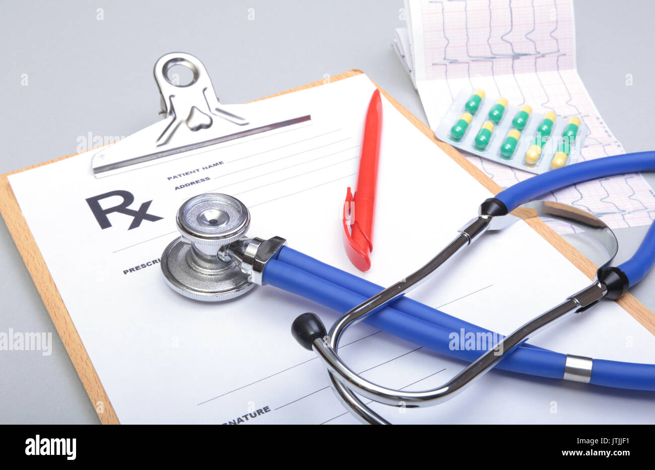 RX prescription, Red heart and a stethoscope on white background Stock ...