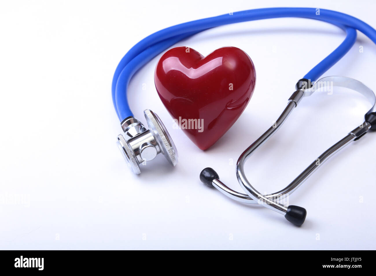 Medical stethoscope and red heart isolated on white Stock Photo - Alamy