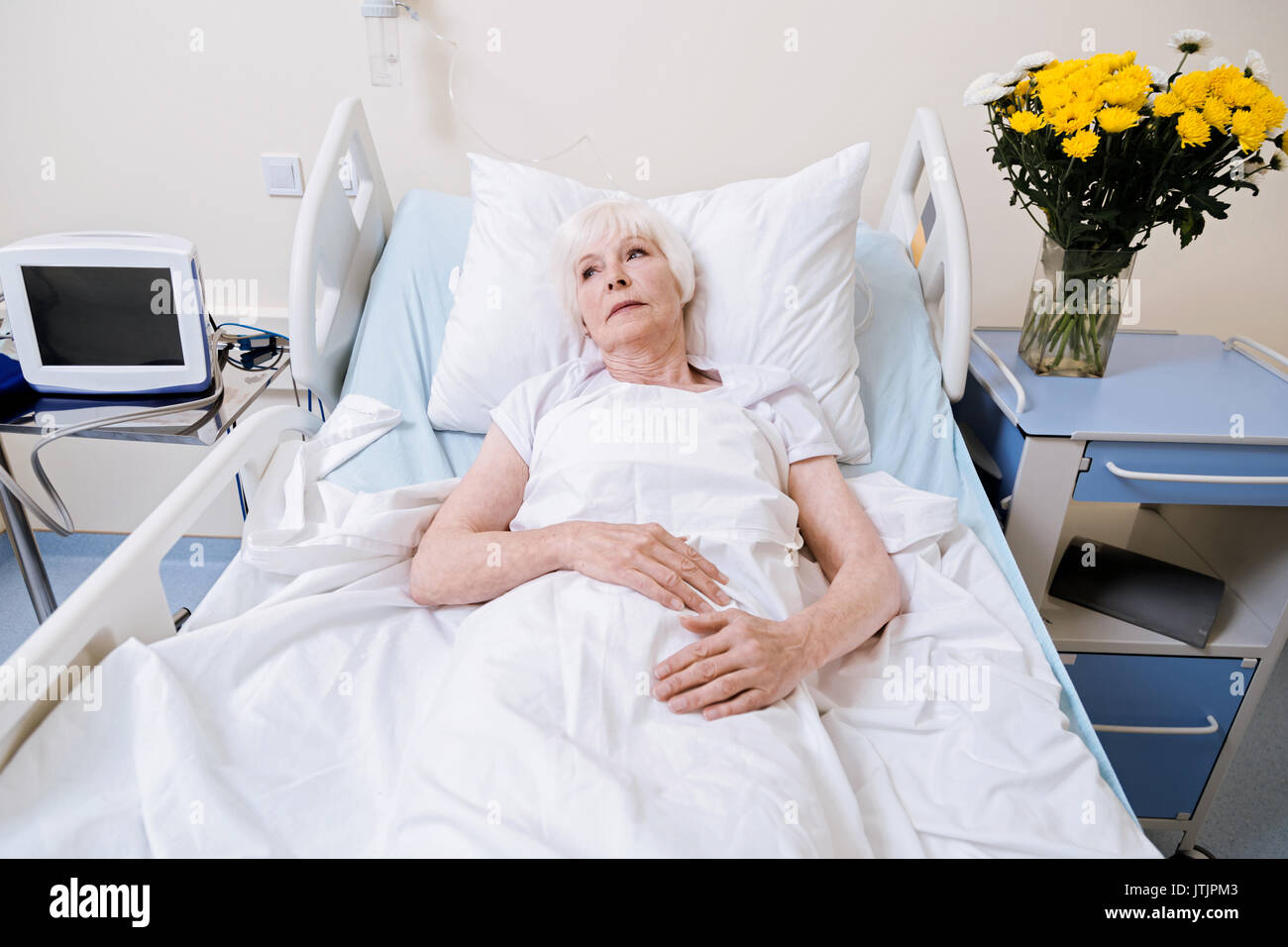 Fragile elderly woman restoring her strength in the hospital Stock ...