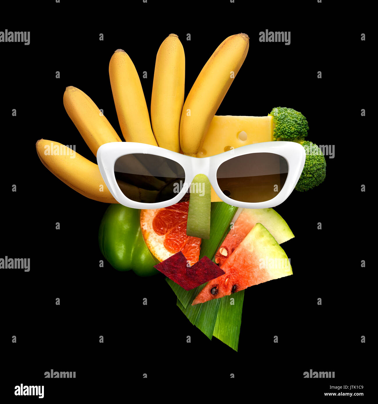 Quirky food concept of cubist style female face in sunglasses made of ...
