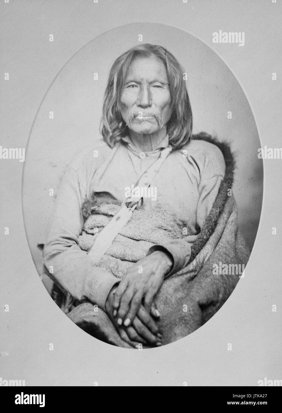 Sitting Bear (Satank, Set angya), a Kiowa chief, half length, seated ...