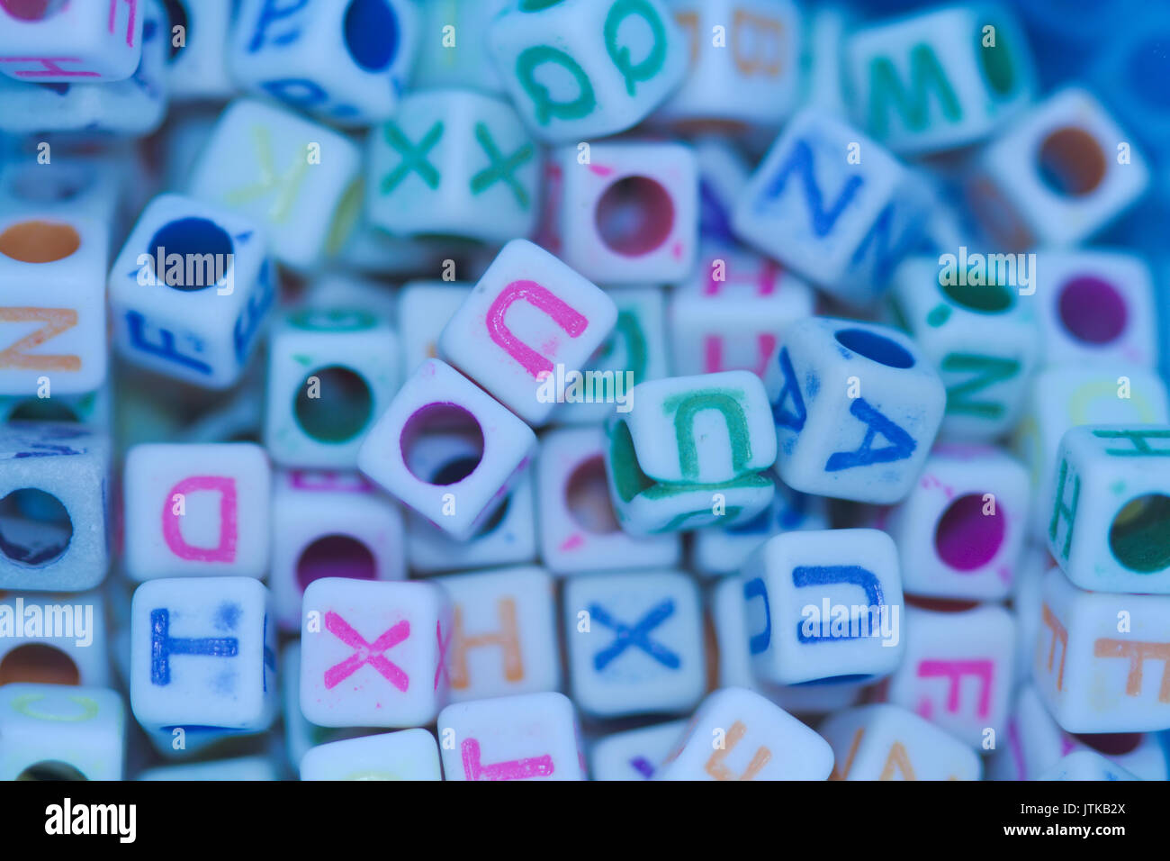 Mini coloured letter craft cubes Stock Photo - Alamy