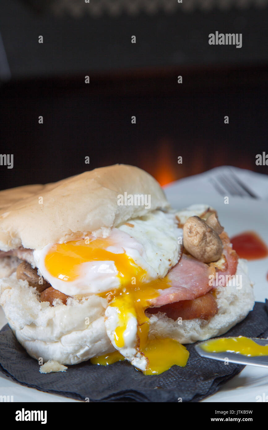 English breakfast in a bread roll Stock Photo - Alamy