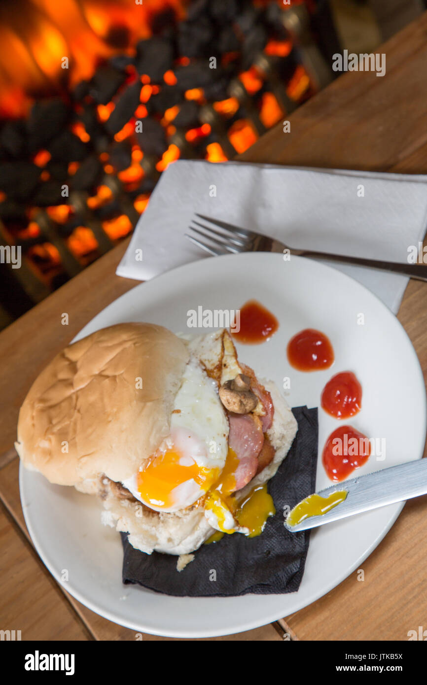 English breakfast in a bread roll Stock Photo - Alamy
