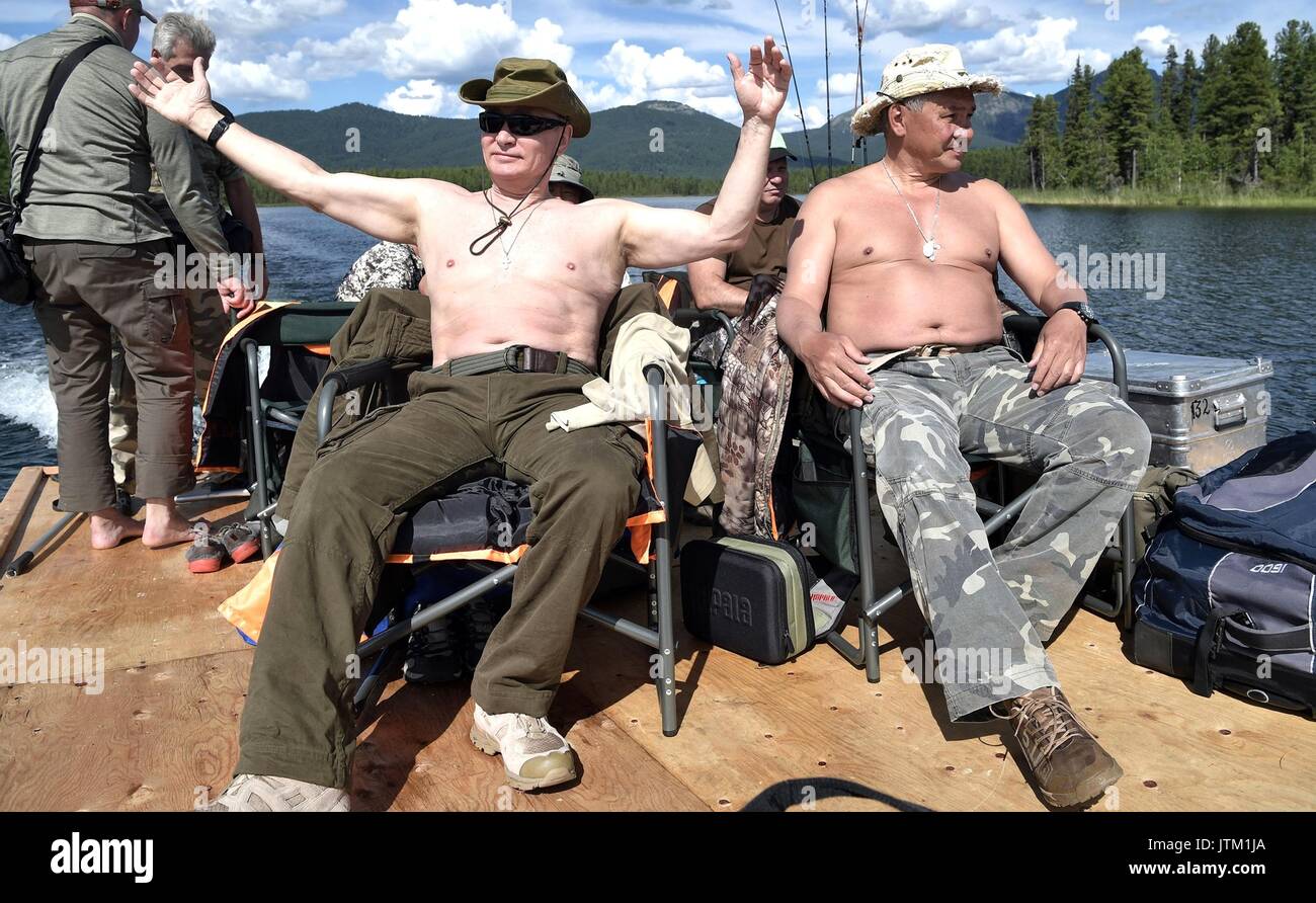 Russian President Vladimir Putin, left, and Defense Minister Sergei ...