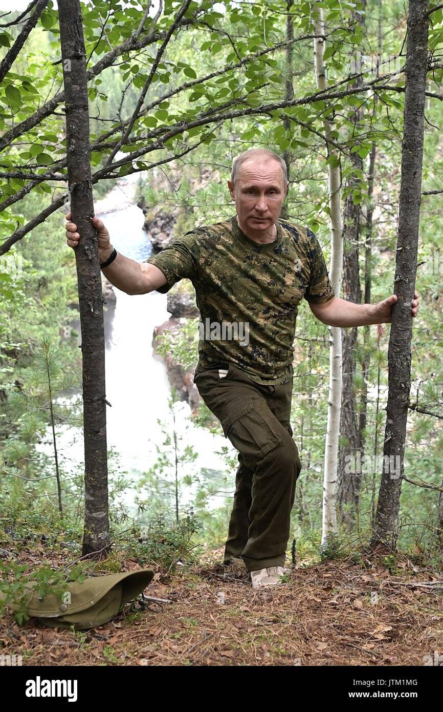 Russian President Vladimir Putin wearing camouflage during a hike in ...