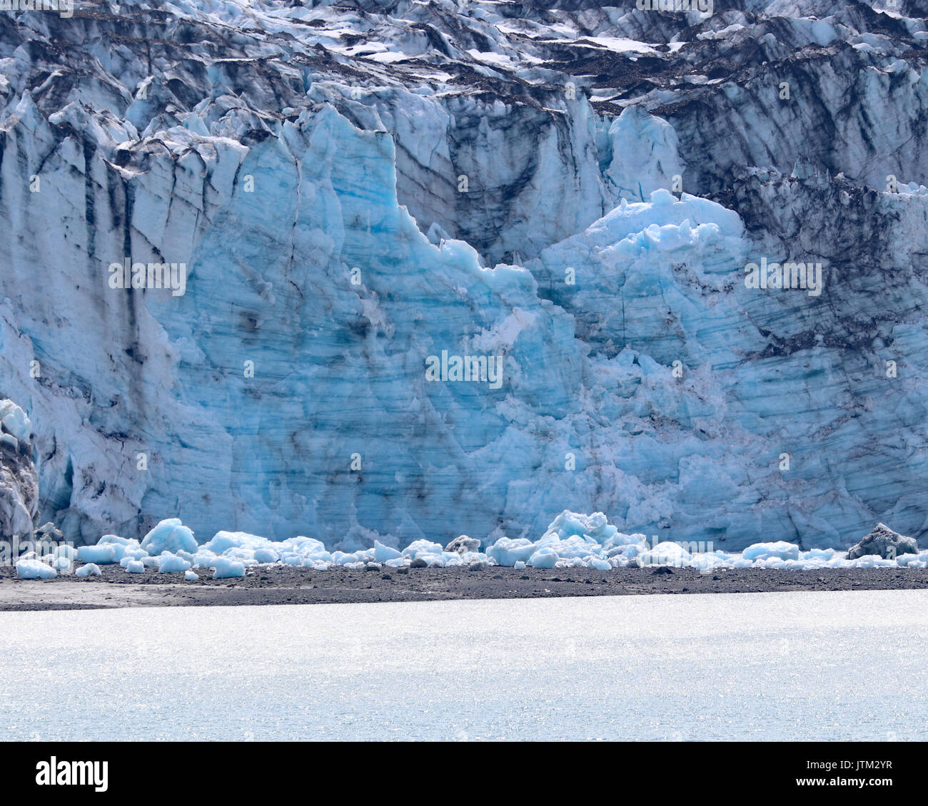 Bright blue ice after calving on Lamplugh glacier Stock Photo - Alamy