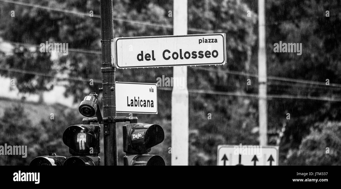 Street signs and Colosseum in Rome Stock Photo - Alamy