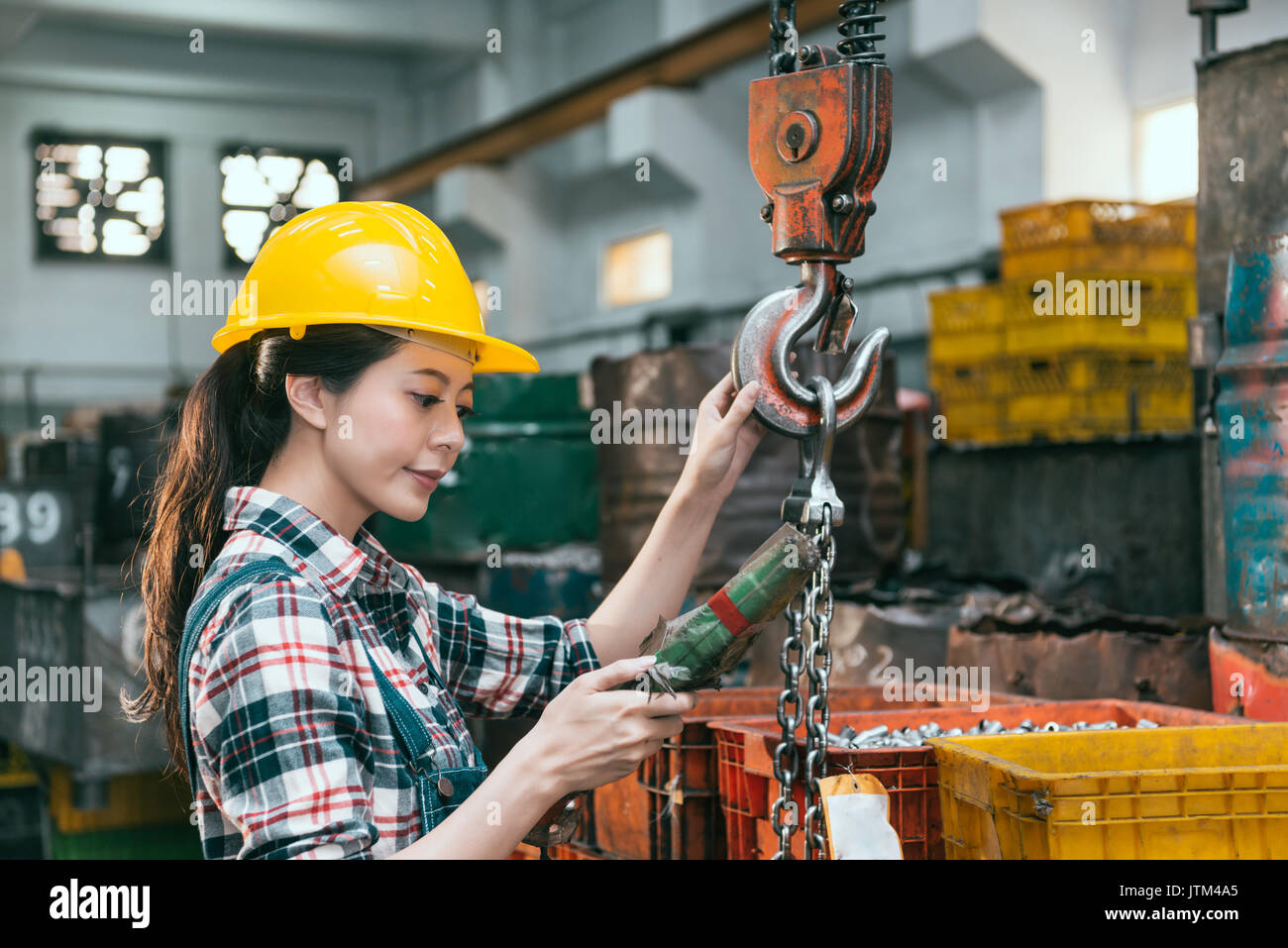 Worker wearing helmet hi-res stock photography and images - Alamy