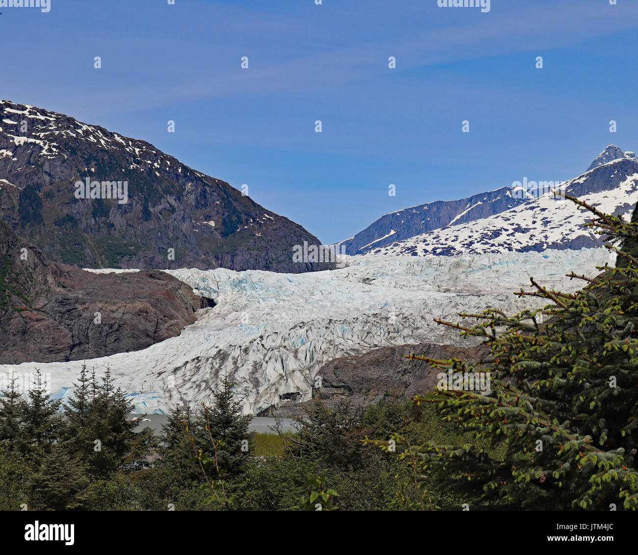 Mendenhall Glacier extends from the Juneau Icefields and ends in ...