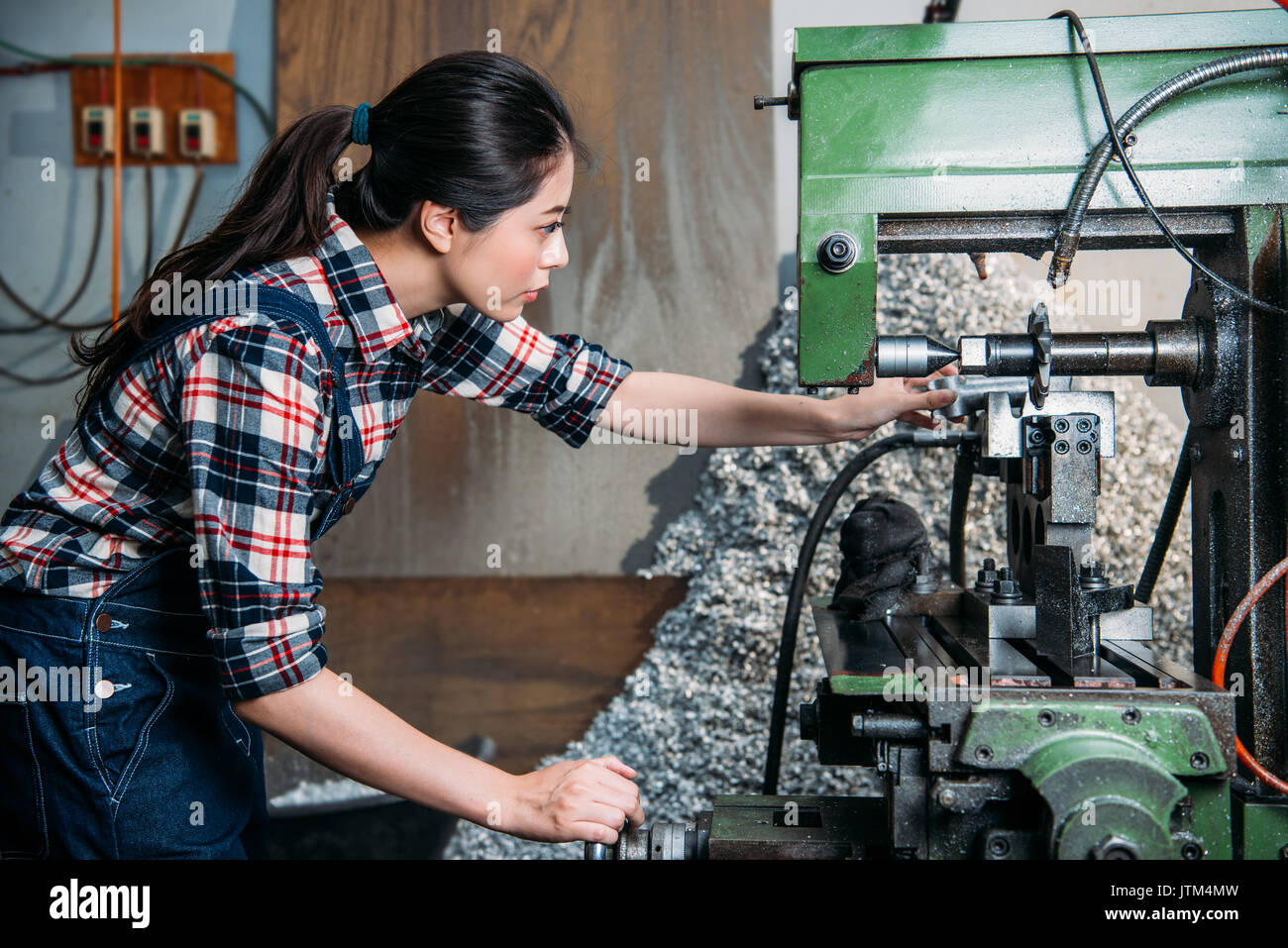 beautiful components factory female staff using technology machine ...