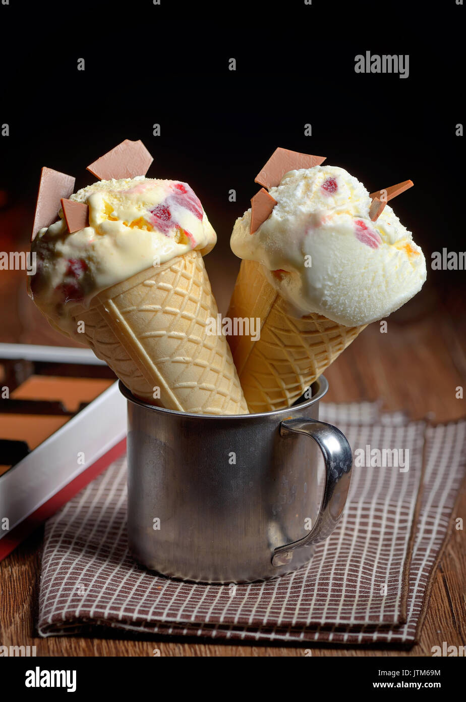 Two ice cream cones in mug Stock Photo - Alamy