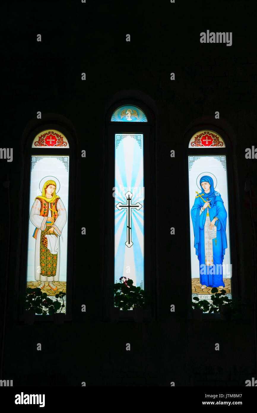 colorful christian church saints stained glass windows Stock Photo - Alamy
