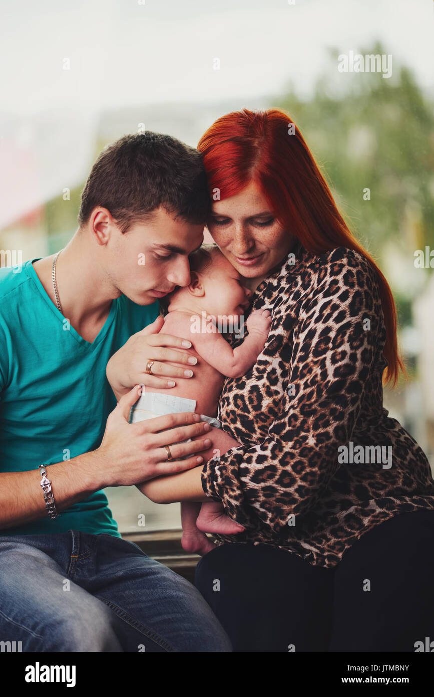 happy parents with their newborn baby Stock Photo - Alamy