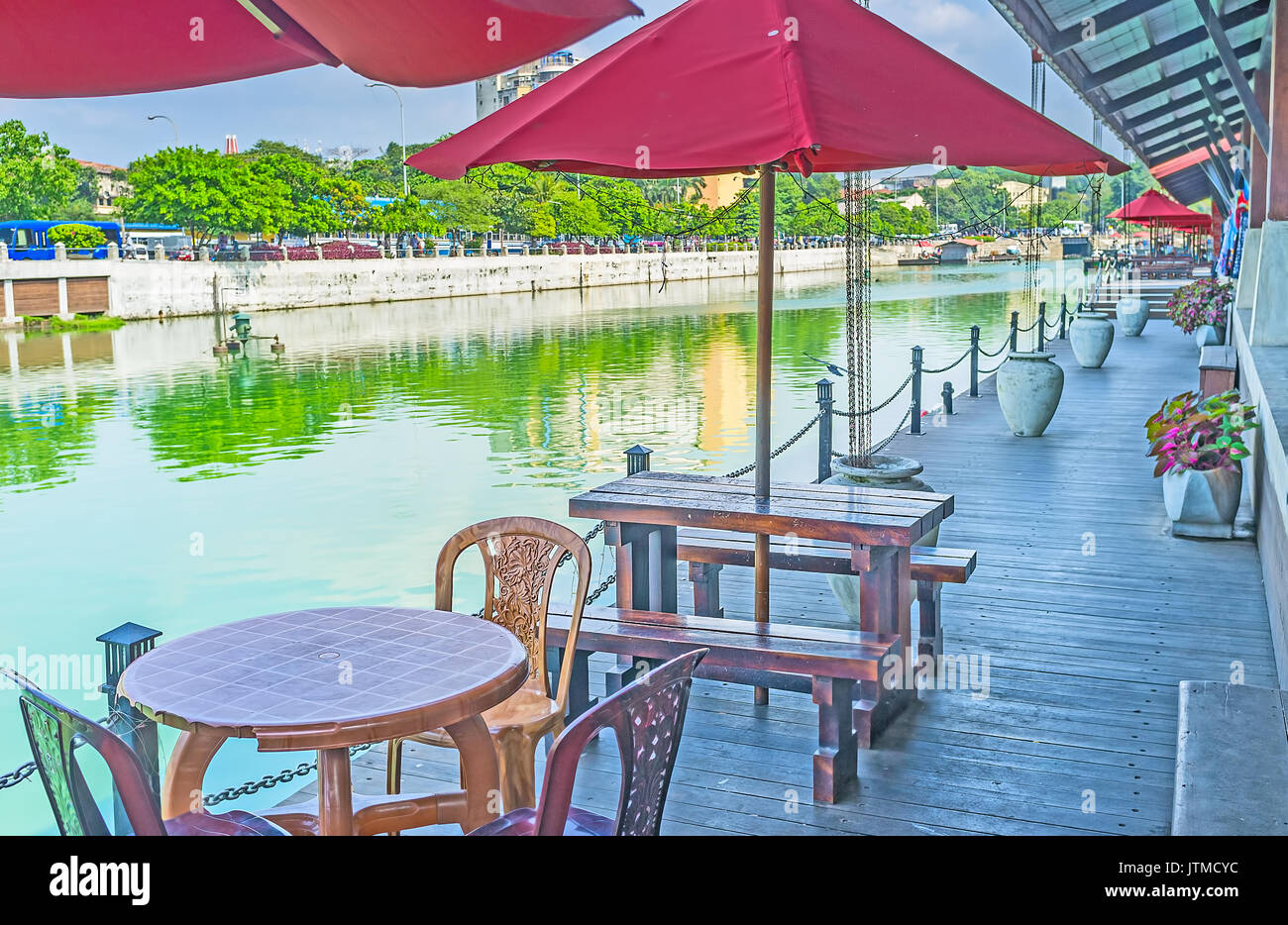 The open air cafe in Pettah Floating Market on bank of Beira lake in ...