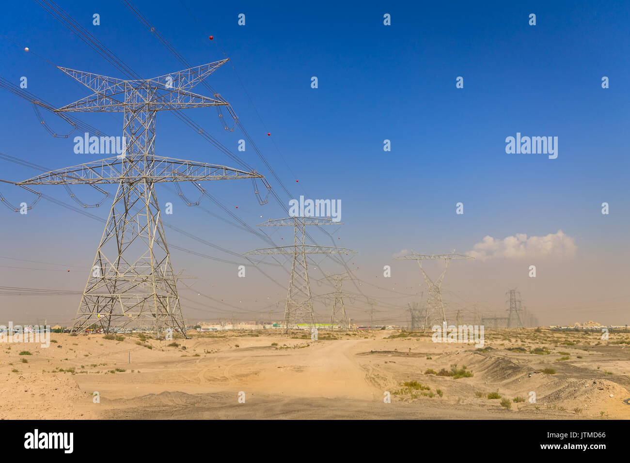 Electric grid lines in desert. Electric transmission lines in the ...