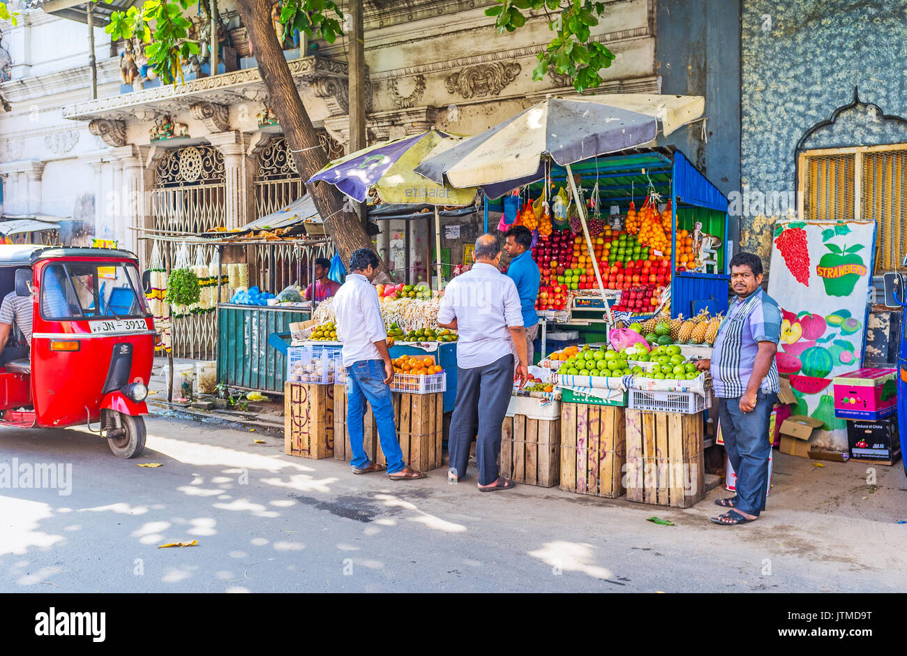 COLOMBO, SRI LANKA - DECEMBER 7, 2016: The fruit stalls located next to ...