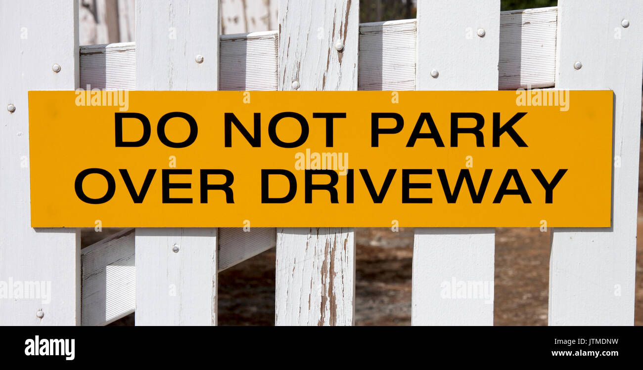 Do Not Park Over Driveway sign Stock Photo - Alamy