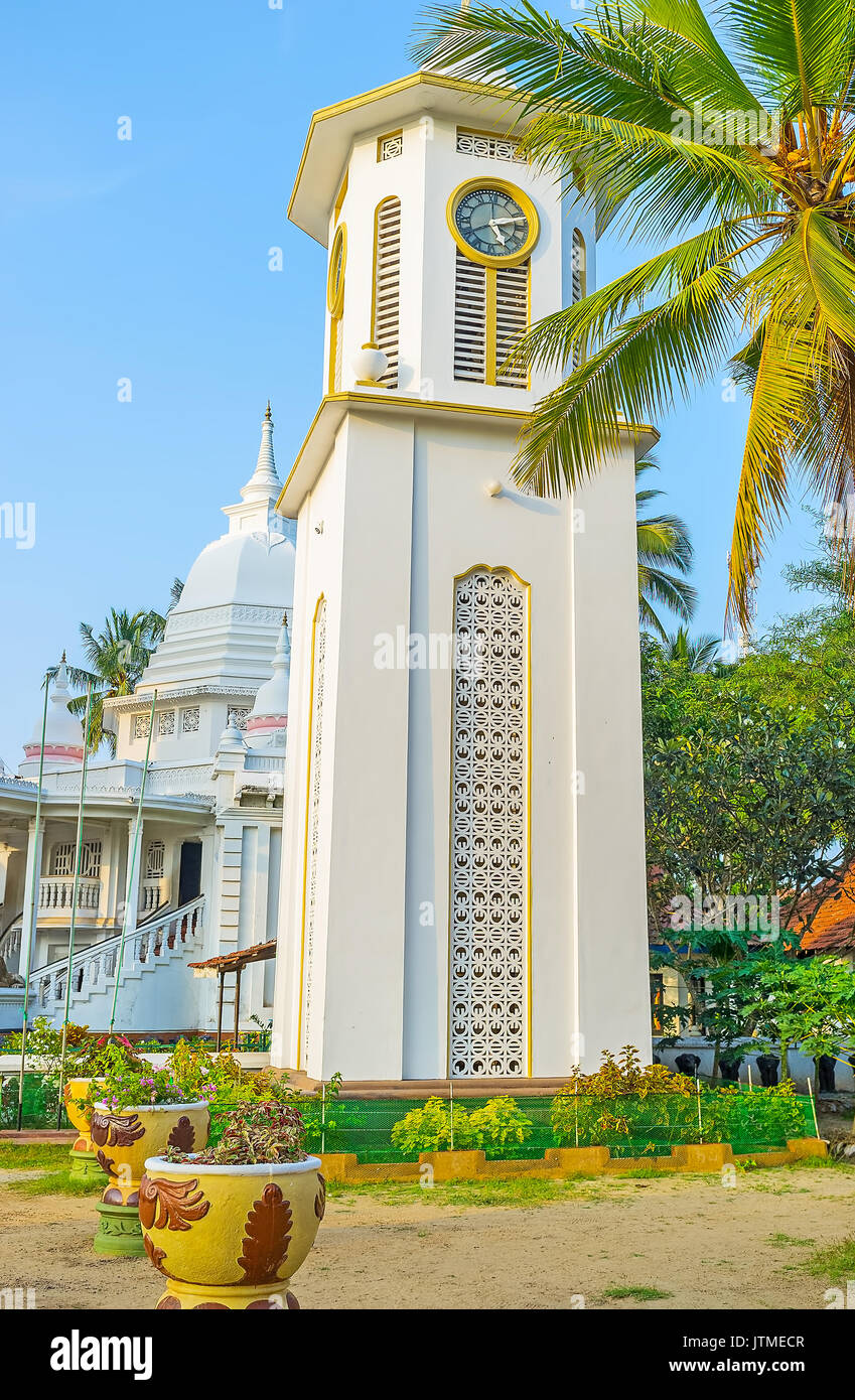 The beautiful clock tower of Angurukaramulla Buddhist Temple ...