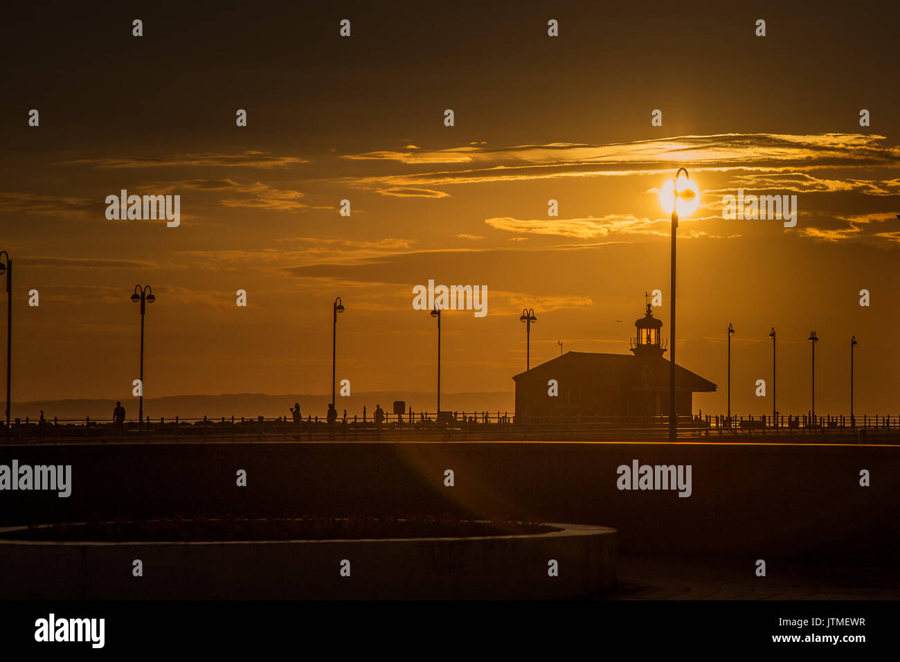 A beautiful colorful sunset view on the Morecambe beach Stock Photo - Alamy