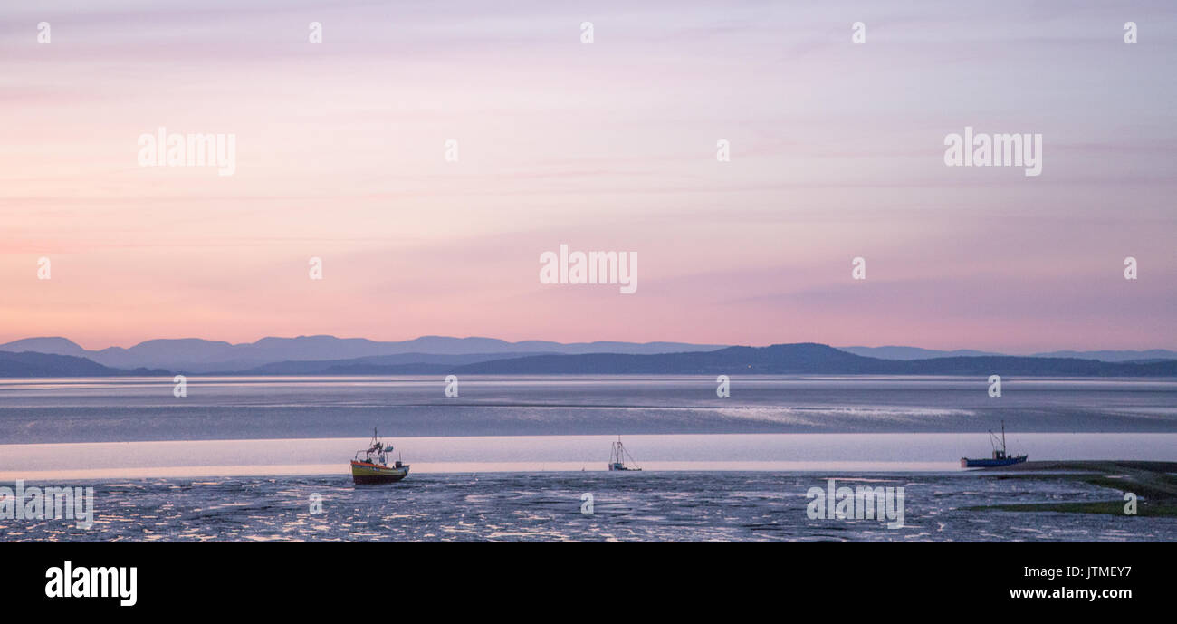 A beautiful colorful sunset view on the Morecambe beach Stock Photo - Alamy