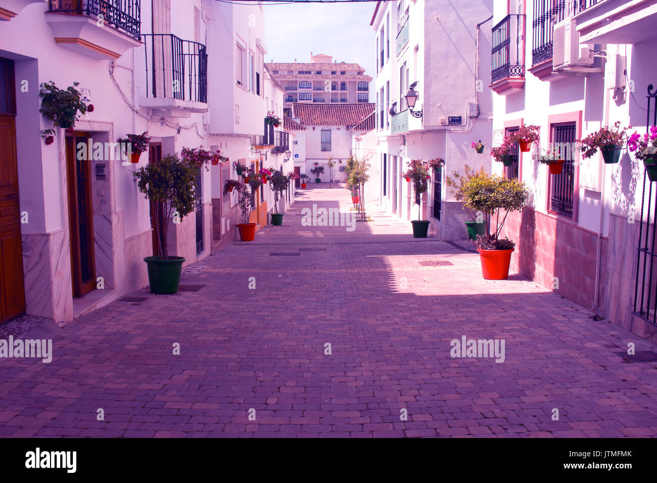 Street. Beautiful Spanish house. Flowers and trees Stock Photo - Alamy