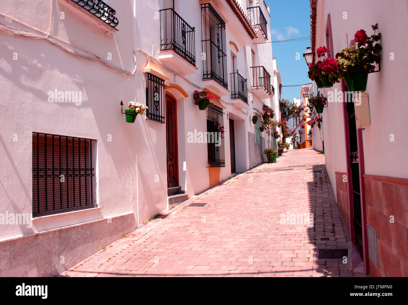 Street. Beautiful Spanish house. Flowers and trees Stock Photo - Alamy