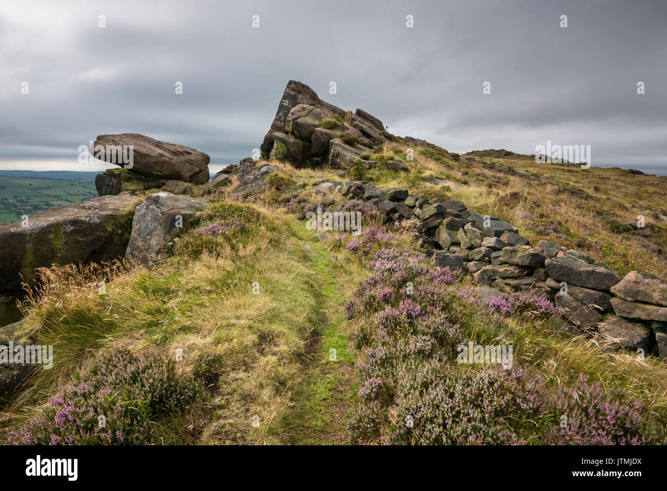 Path on the rocky edge at The Roaches in the Peak District national ...