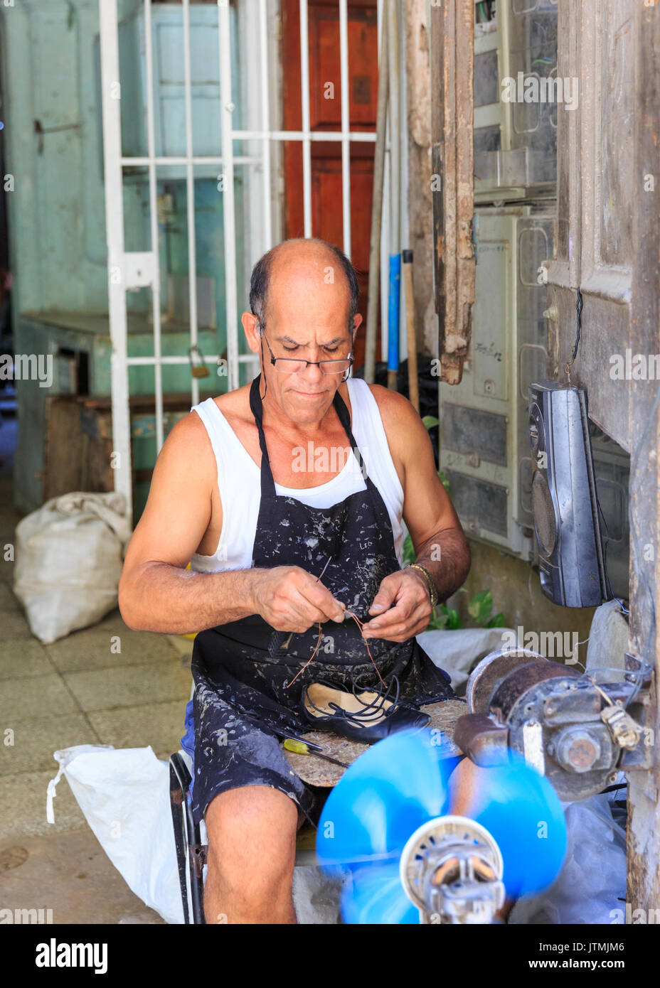 Old fashioned shoe repair hi-res stock photography and images - Alamy