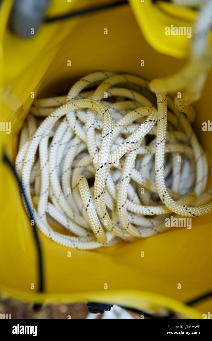 Climbing rope inside a yellow backpack Stock Photo - Alamy