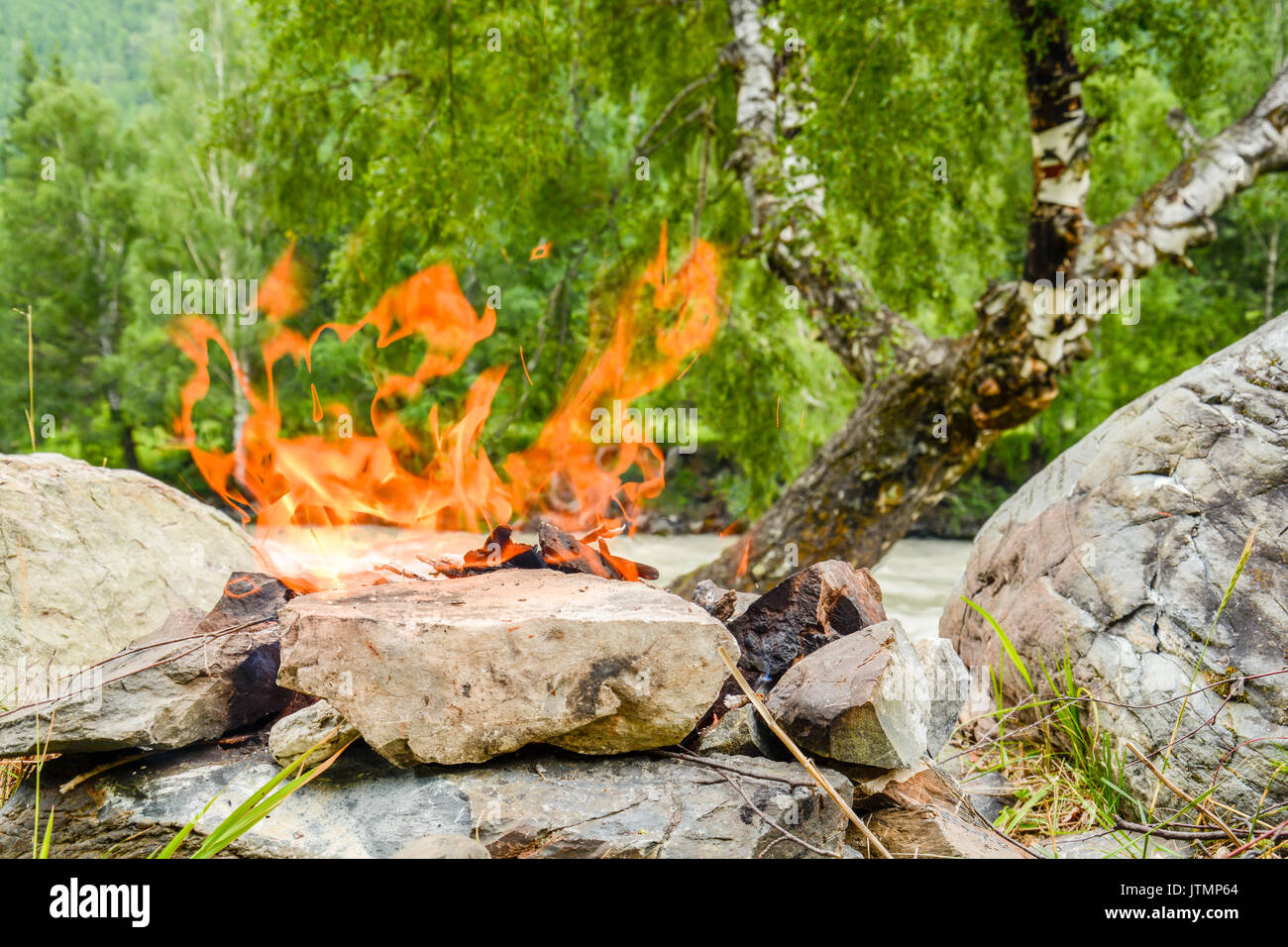 Hot campfire rocks hi-res stock photography and images - Alamy