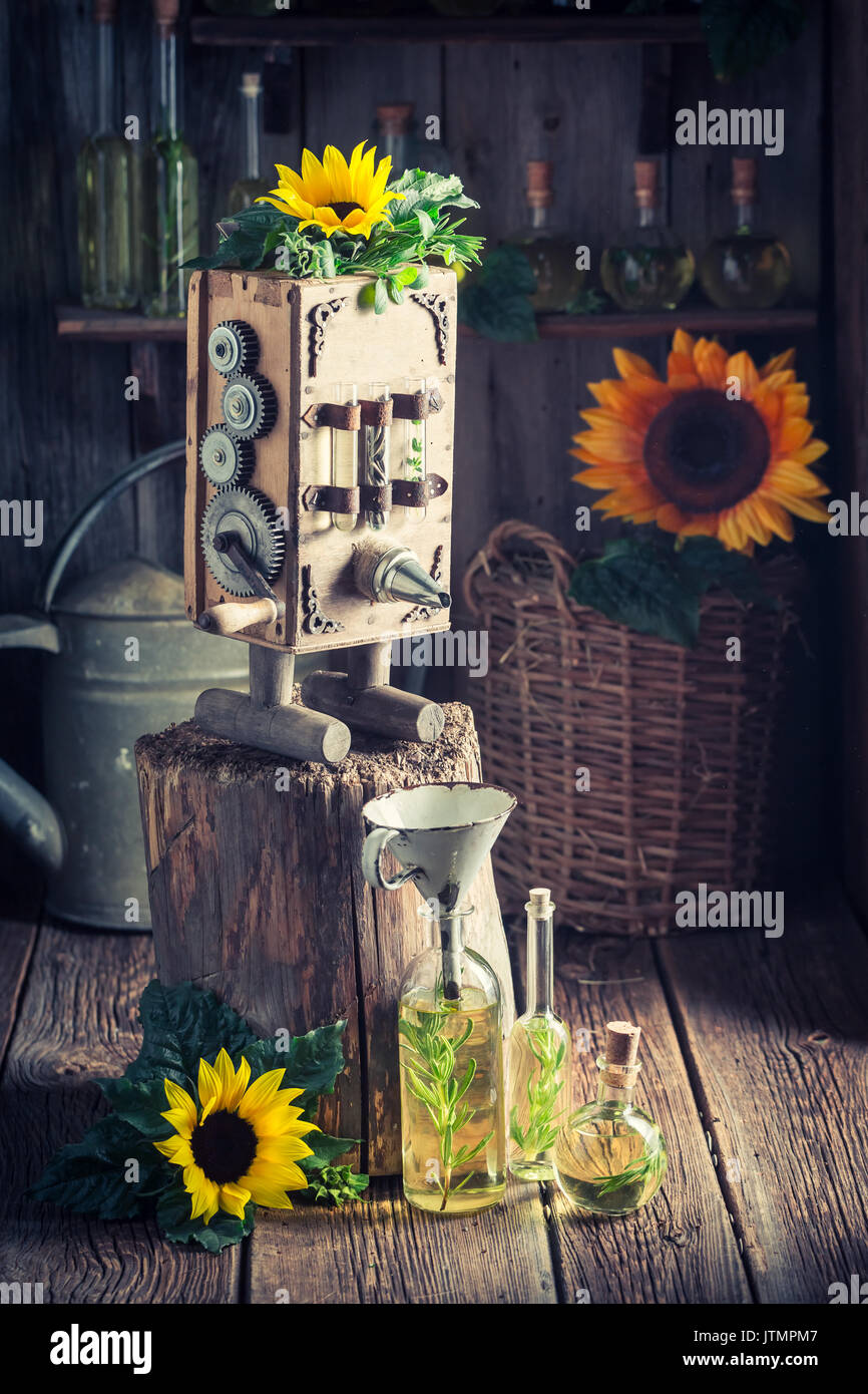 Extraordinary machine to make oil in old basement Stock Photo - Alamy