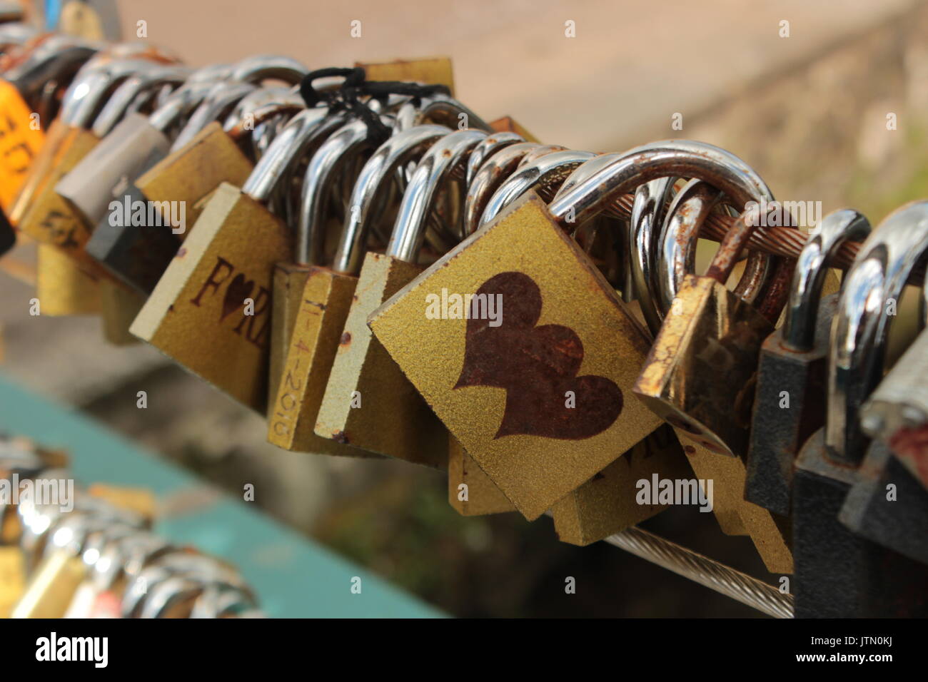 Bridge full of padlocks hi-res stock photography and images - Alamy