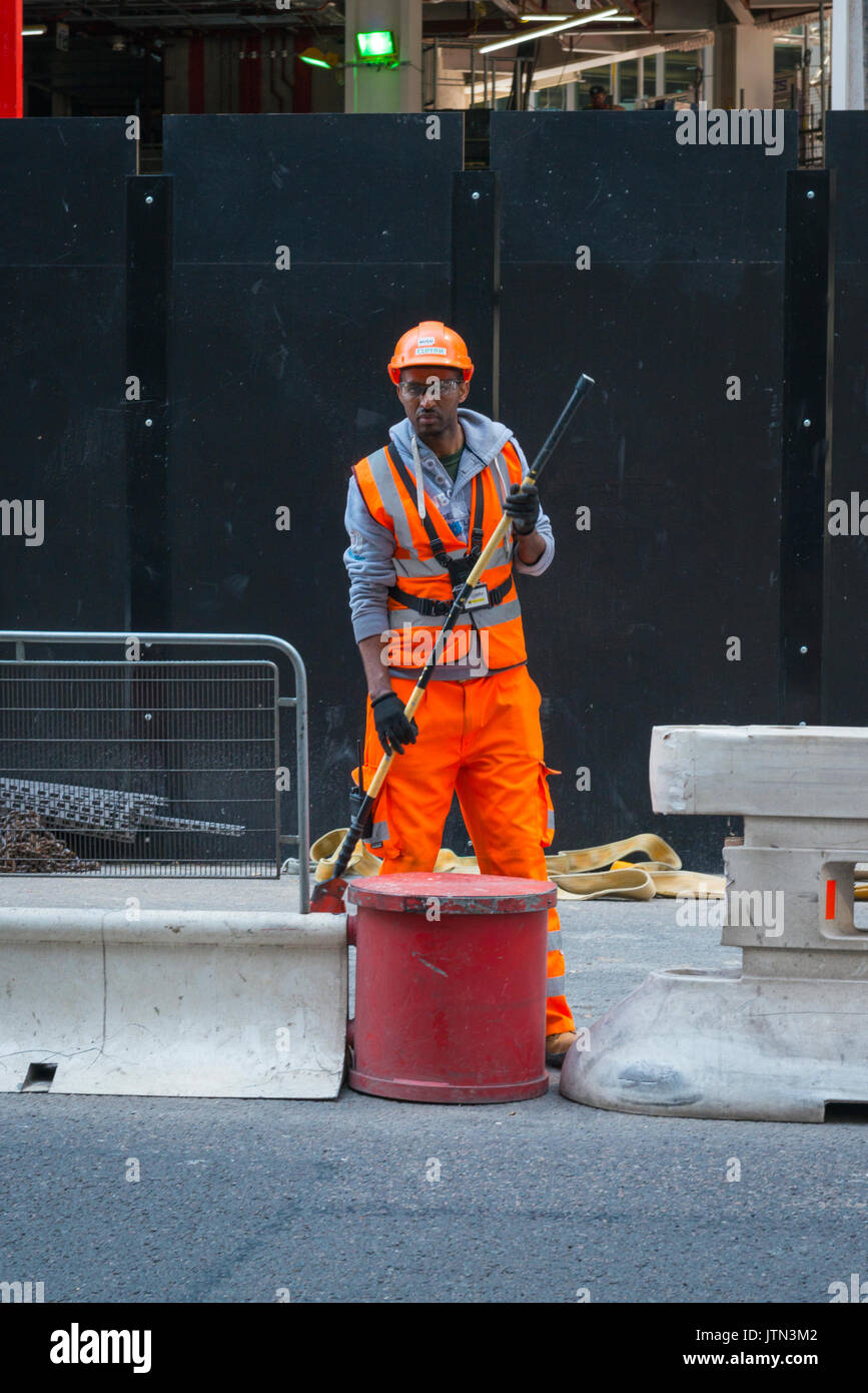 UK London City Lime Street British workman high vis jacket trousers ...