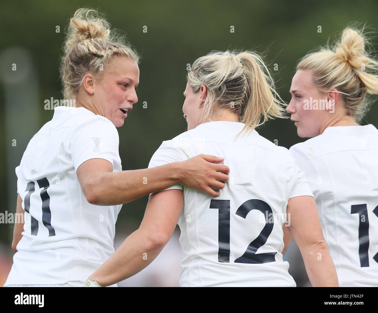 England's Kay Wilson (left) after scoring her side's fourth try during ...