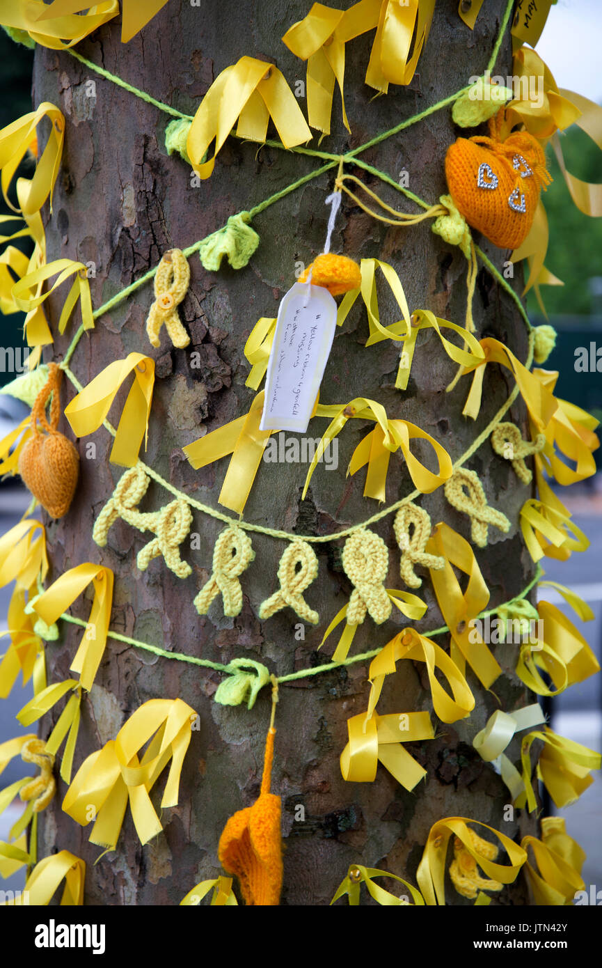 Grenfell Tower, West London. Aftermath of the tragedy. Yellow ribbons ...