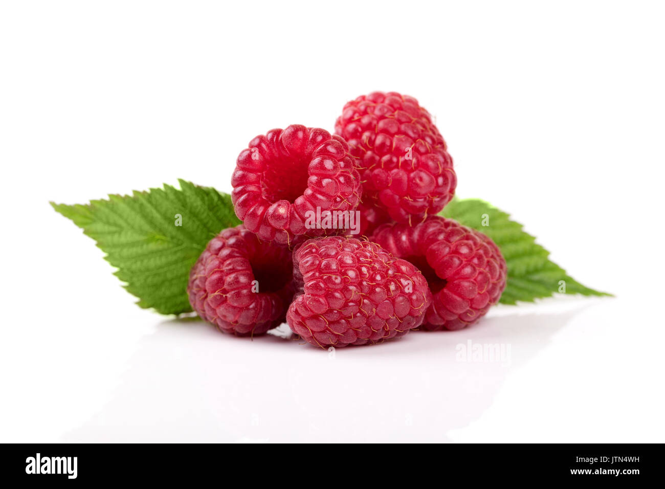raspberry with leaves isolated on white background Stock Photo - Alamy