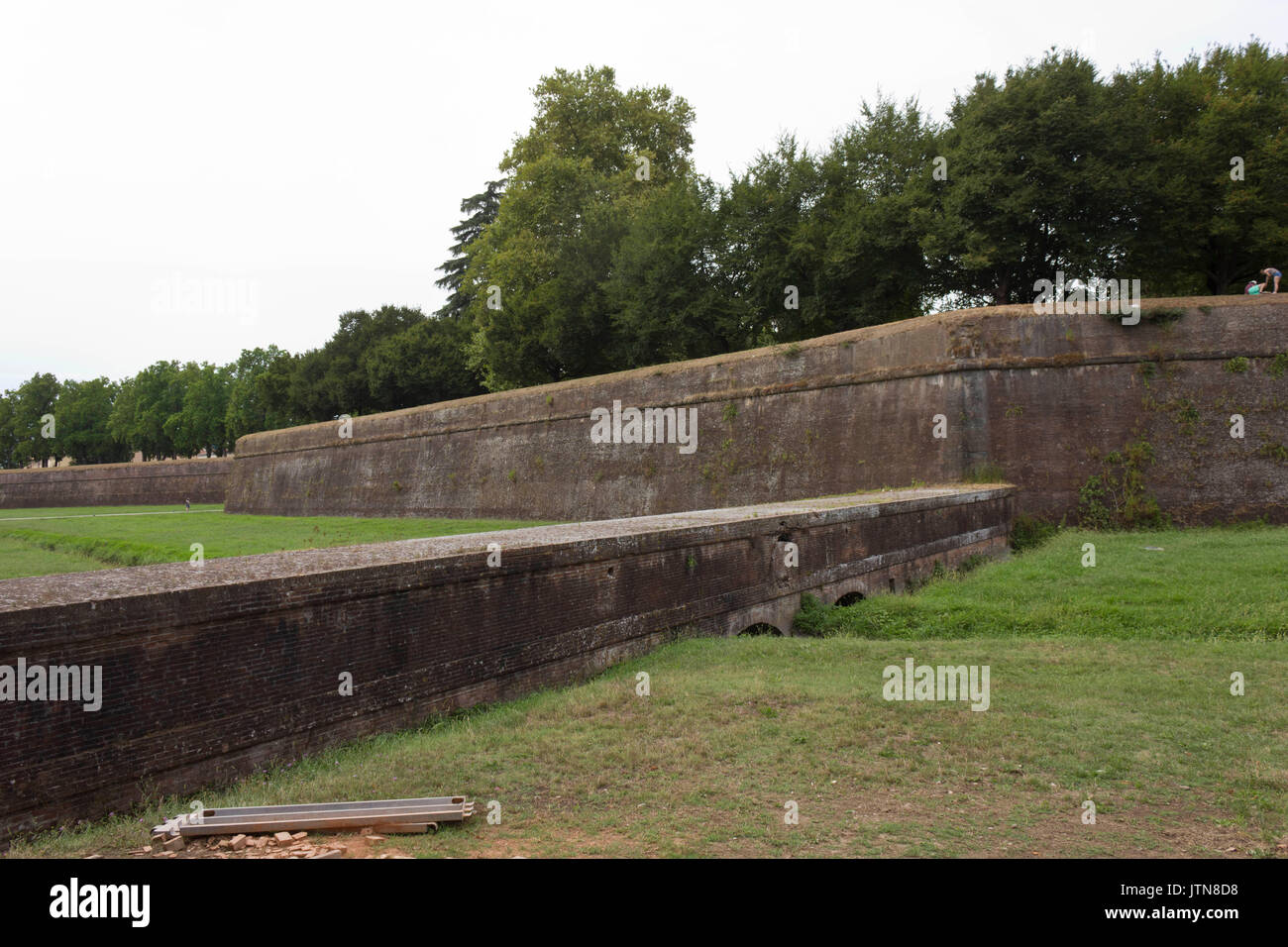 LUCCA, ITALY - AUGUST 15 2015: Walls surrounding the fortified city of ...