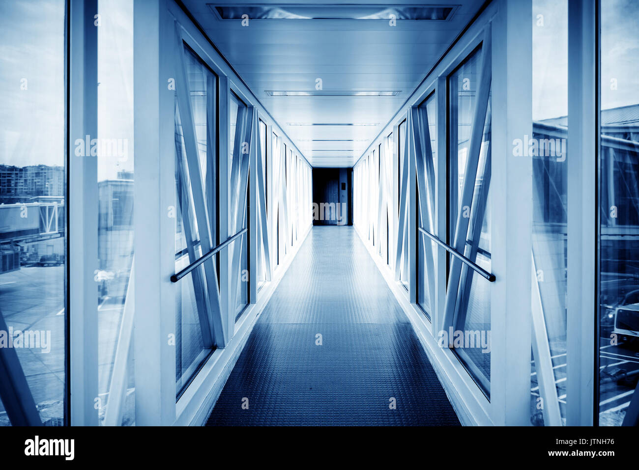 Shanghai Pudong Airport boarding bridge, blue tone map Stock Photo - Alamy