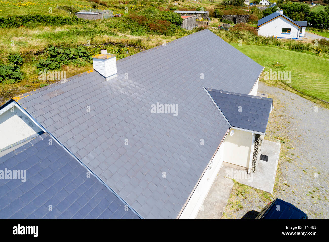 Slate roof tiles hi-res stock photography and images - Alamy